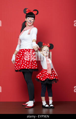 two girls with mouse masks Stock Photo - Alamy