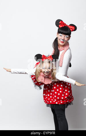 two girls with mouse masks Stock Photo - Alamy