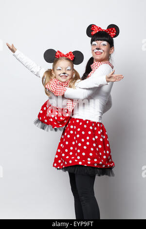 two girls with mouse masks Stock Photo - Alamy