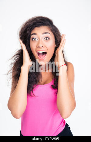 Amazed teen schoolgirl. Teenager school girl with backpack holding ...