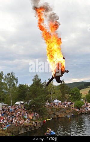 Hrimezdice, Czech Republic. 1st Aug, 2015. Participant jumps during the ...