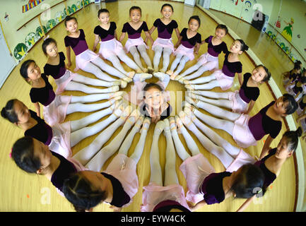Bozhou, China's Anhui Province. 4th Aug, 2015. Children practice basic ...