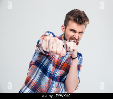 Young mad man isolated on white Stock Photo - Alamy