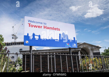A Welcome to Tower Hamlets sign in front of the Avant-Garde residential ...