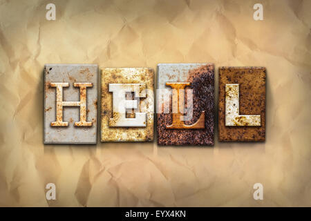 The word "HELL" written in rusty metal letterpress type on a dark ...
