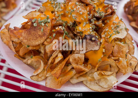 Carnival style ribbon cut potato chip fries Stock Photo - Alamy