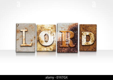 The word "LORD" written in rusty metal letterpress type sitting on a ...
