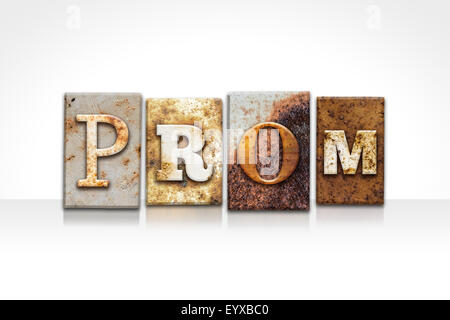 The word "PROM" written in rusty metal letterpress type on a crumbled ...