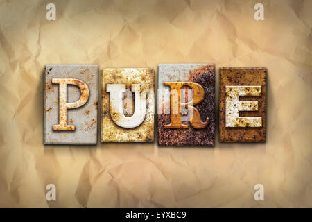 The word "PURE" written in rusty metal letterpress type on an old aged ...