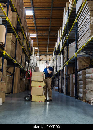 Laptop in a warehouse Stock Photo - Alamy
