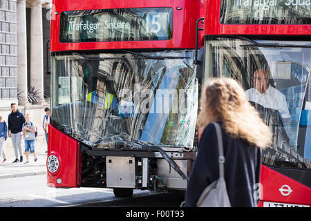 A London bus with a smashed windscreen after it ran into the back of ...