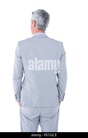 A back turned businessman on a background Stock Photo - Alamy