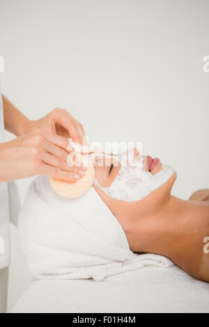 Hand cleaning womans face with cotton swabs Stock Photo - Alamy