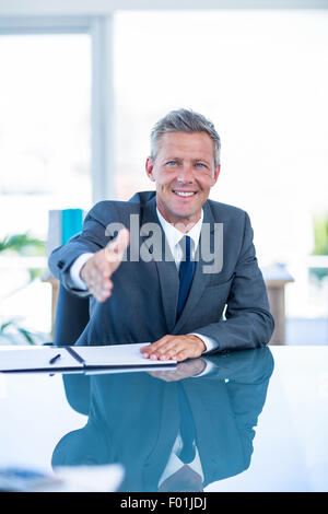 Businessman ready to shake hand Stock Photo - Alamy