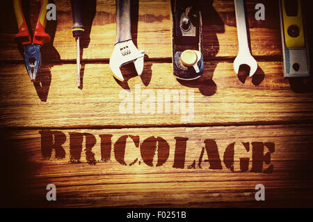 Bricolage against desk with tools Stock Photo - Alamy