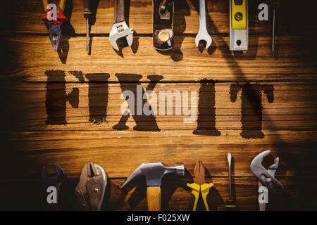 Fix it against desk with tools Stock Photo - Alamy