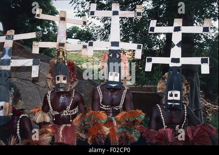 Dogon dancers wearing Kanaga masks performing the Dama or masked ...