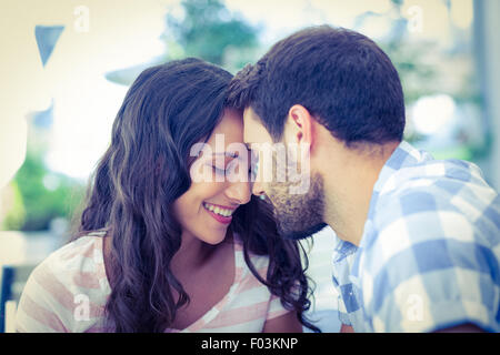 cute couple putting foreheads against each others Stock Photo - Alamy