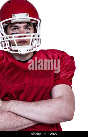 American football player with arms crossed Stock Photo - Alamy