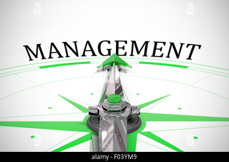 Management against compass Stock Photo - Alamy