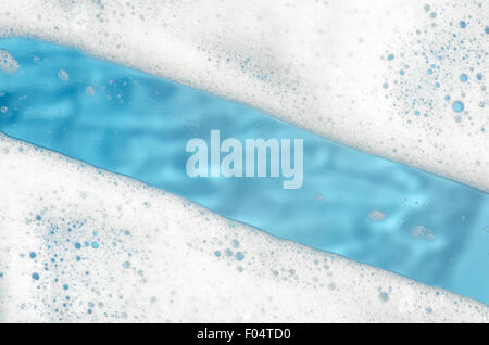 closeup to foam on window glass blue background Stock Photo - Alamy