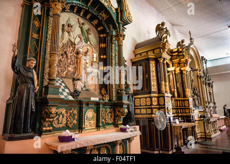PANAMA CITY, Panama — Ornate side altars (retablos) line the nave walls ...