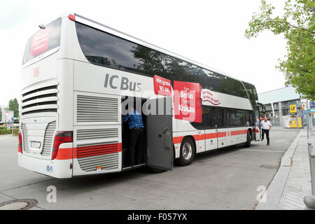 Passengers enter an 'IC Bus' at the train station 'Suedkreuz' in Berlin ...