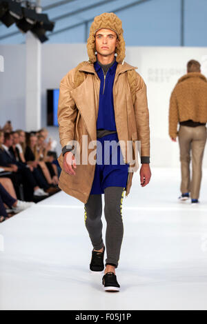 A model walks the Closing Town Hall Runway wearing a Sandro Paris ...