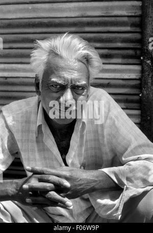 Portrait of dignified but sad old man of Engombe tribe Sumba Island ...