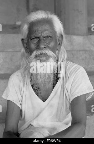 Portrait of dignified but sad old man of Engombe tribe Sumba Island ...