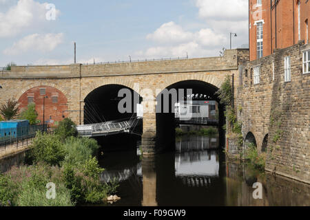 The Cobweb bridge suspended under the Wicker viaduct, above the river ...
