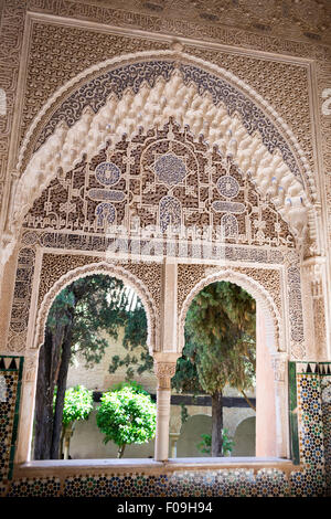 Detail of Moorish window and Arabic inscriptions in the Palacios ...