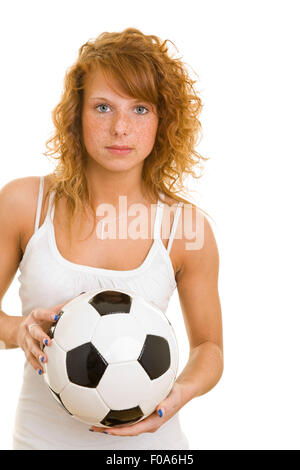young woman holding soccer ball on her hand Stock Photo - Alamy