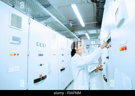 Scientist in control room Stock Photo - Alamy