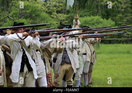 Musket firing during Revolutionary War reenactment at Jockey Hollow in ...