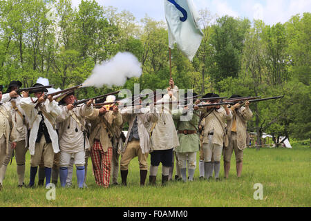 Musket firing during Revolutionary War reenactment at Jockey Hollow in ...