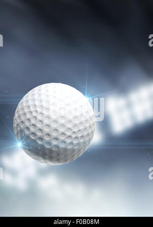 A regular golf ball flying through the air on a stadium background ...