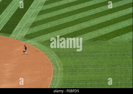 Baseball field abstract patterns with ground crew preparing the field ...