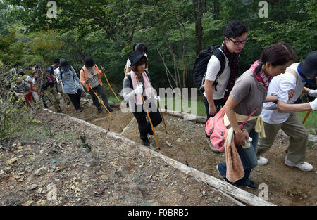 On the ridge of Mt. Osutaka, Japan. 12th Aug, 2015. Bereaved families ...