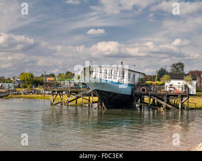 Houseboats on shoreline at West Mersea. Mersea Island. Essex. England ...