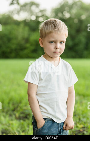 portrait of boy with hands in pockets Stock Photo - Alamy