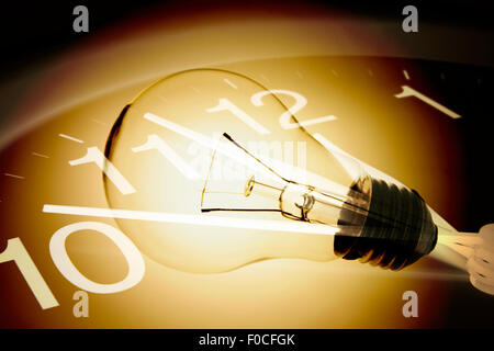 Wall Clock and Light Bulb Stock Photo - Alamy
