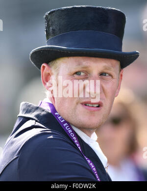 Matthias Alexander Rath of Germany reacts on his horse Totilas after ...