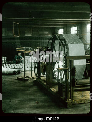 This image depicts the process of reeling silk into small skeins, a ...