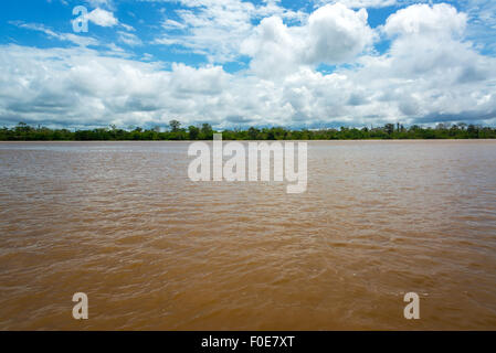View of the brown dirty water of the Amazon River near Leticia ...