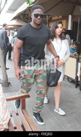 Reggie Bush and his pregnant wife Lilit Avagyan go for lunch at Il ...