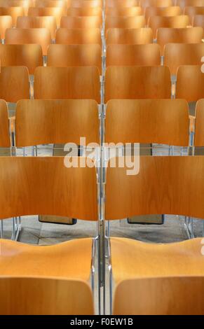 Rows of interlocking chairs Stock Photo - Alamy