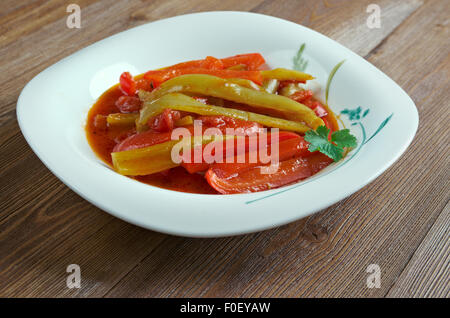 Piperade - typical Basque dish prepared with onion, green peppers, and ...