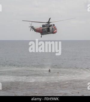Mousehole, Cornwall, UK. 16th August 2015. RNLI lifeboat and RNAS ...