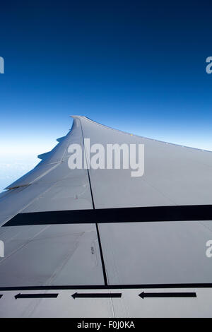 Left wing of a jet airplane Stock Photo - Alamy